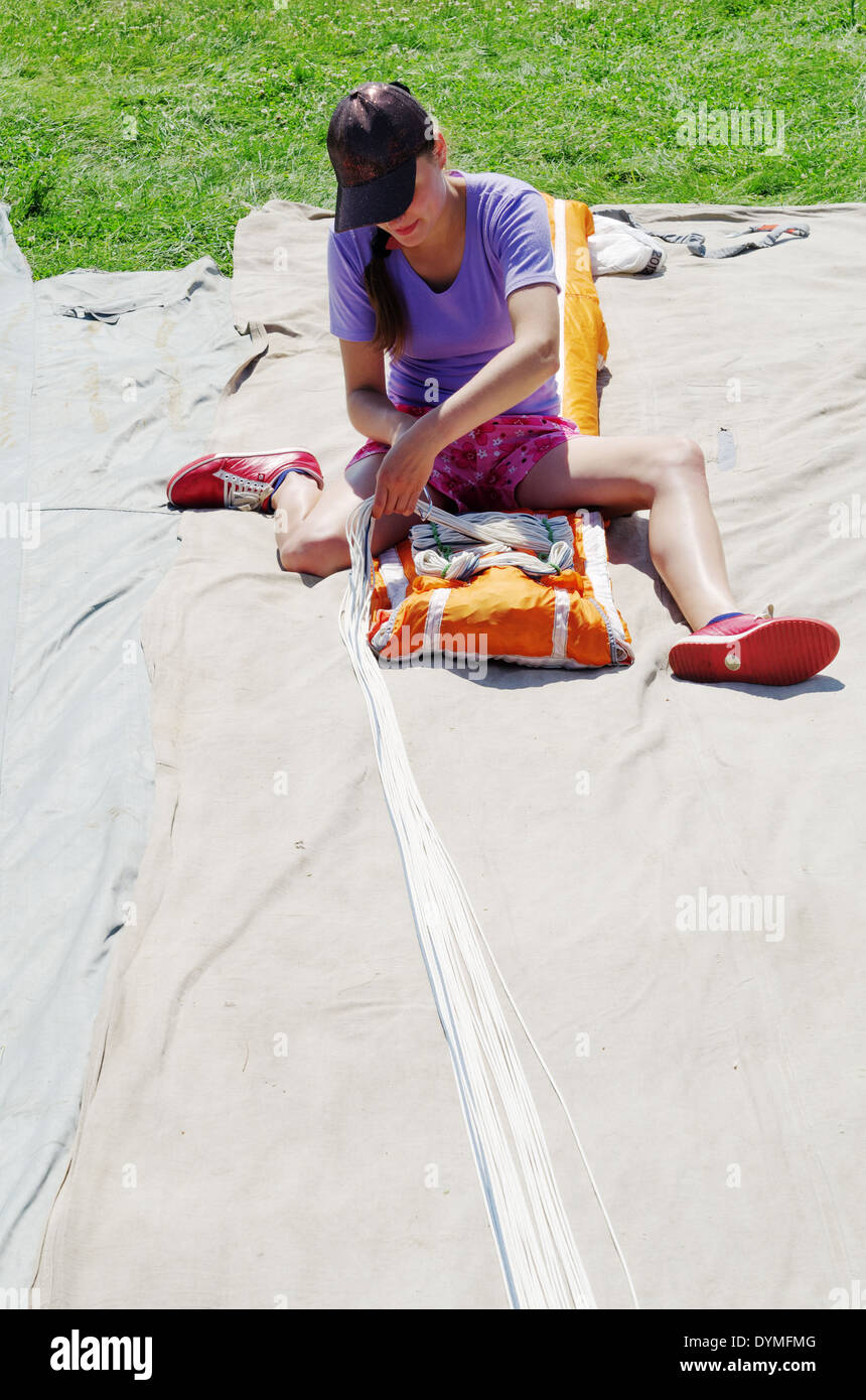 One day with parachutist in airfield. Parachute packing Stock Photo - Alamy