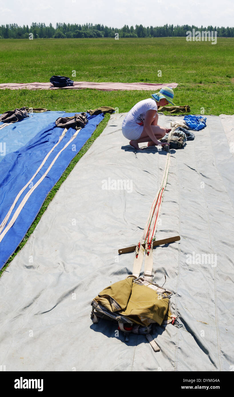 One day with parachutist in airfield. Parachute packing Stock Photo - Alamy