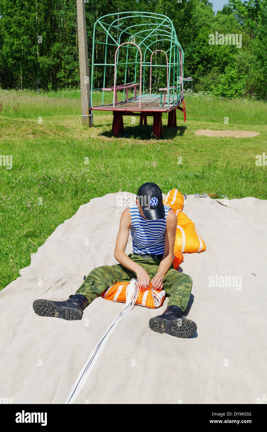 One day with parachutist in airfield. Parachute packing Stock Photo - Alamy