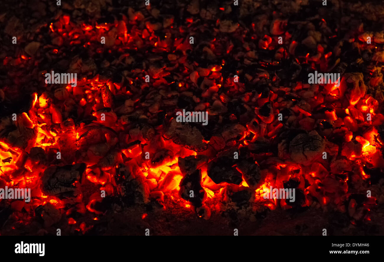 Abstract background of glowing coals in fireplace Stock Photo - Alamy