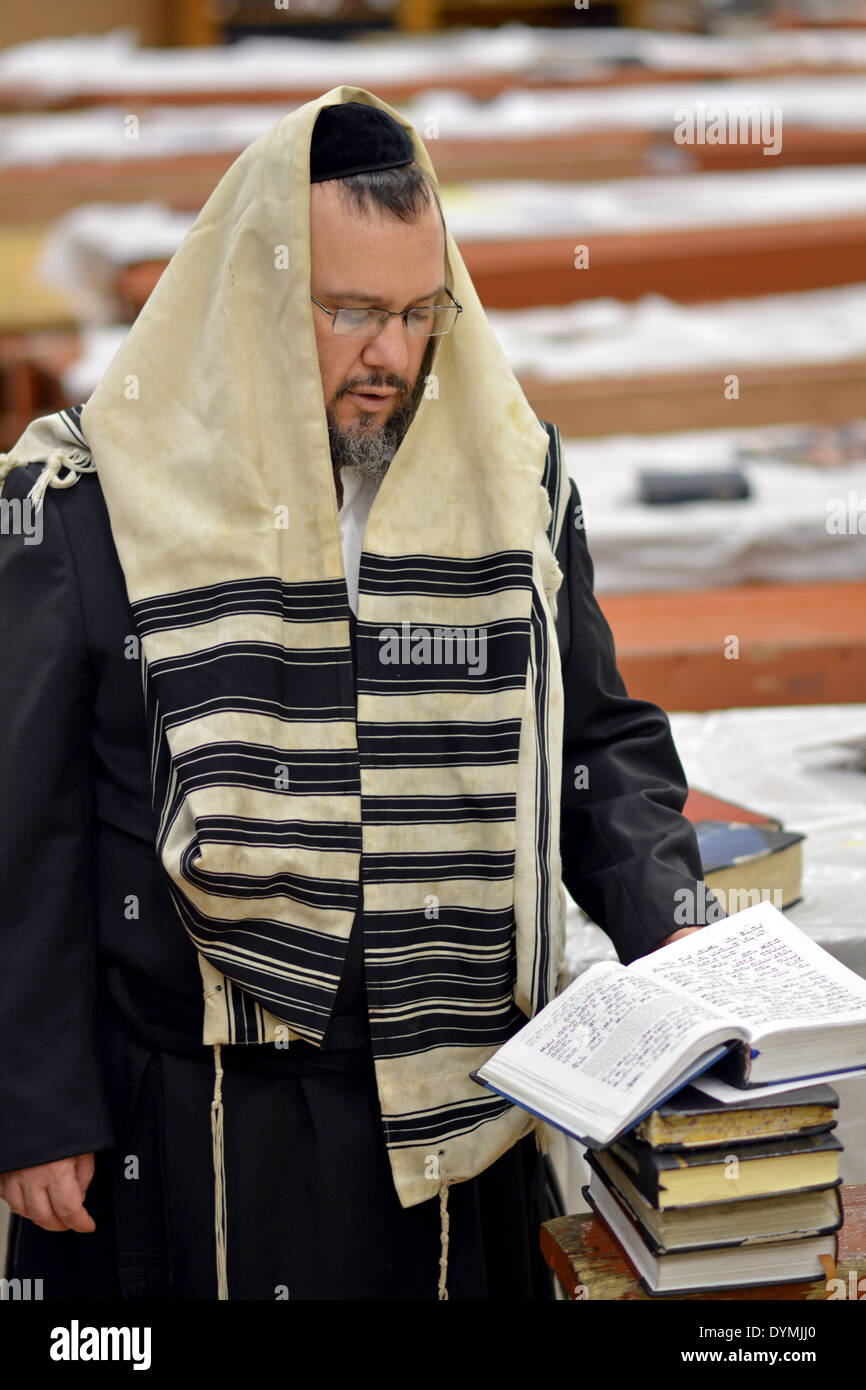 An religious Jewish man at Passover morning prayers at the Lubavitch ...