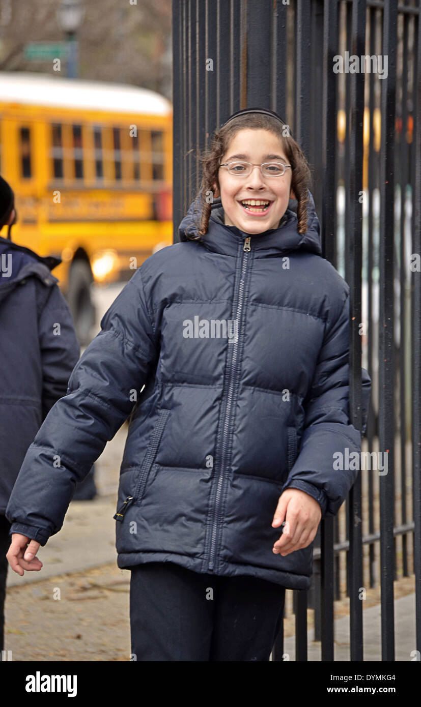 Portrait of a happy religious Jewish boy with long side locks - peyot ...