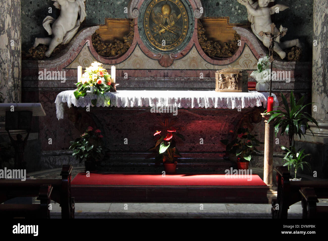 Catholic altar in a church with candles and flowers Stock Photo - Alamy