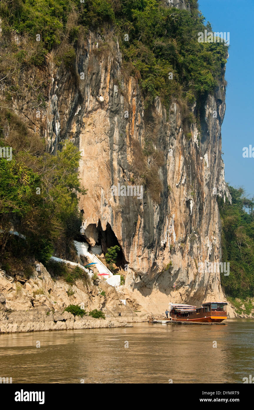 Vertical view of Pak Ou or Tam Ting caves on a sunny day Stock Photo ...