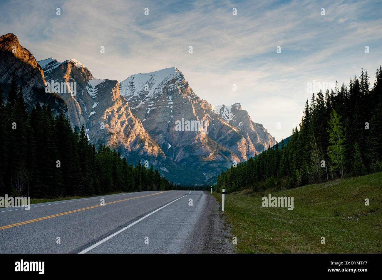 Road surrounded mountains hi-res stock photography and images - Alamy