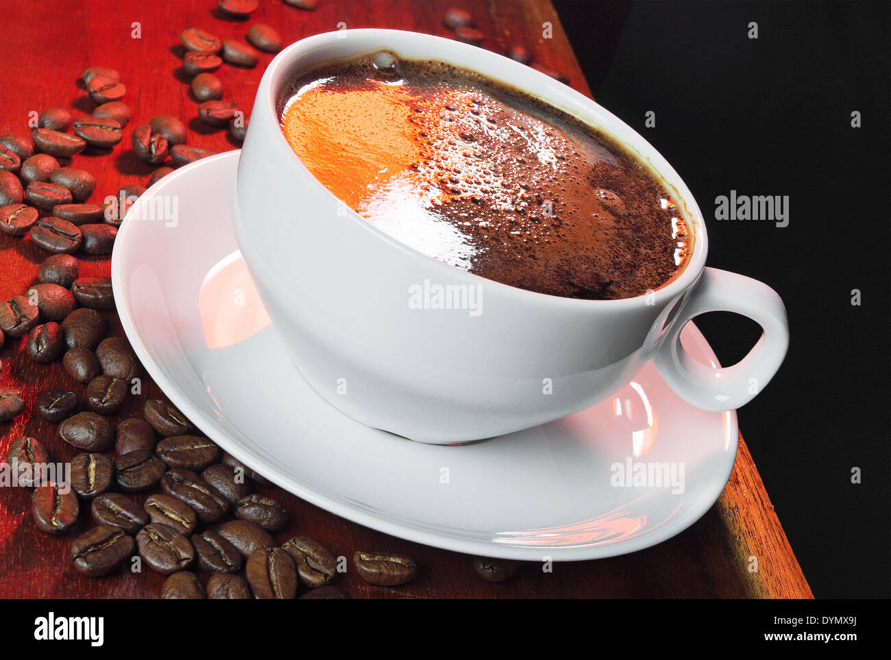 Cup of coffee in the red light Stock Photo - Alamy