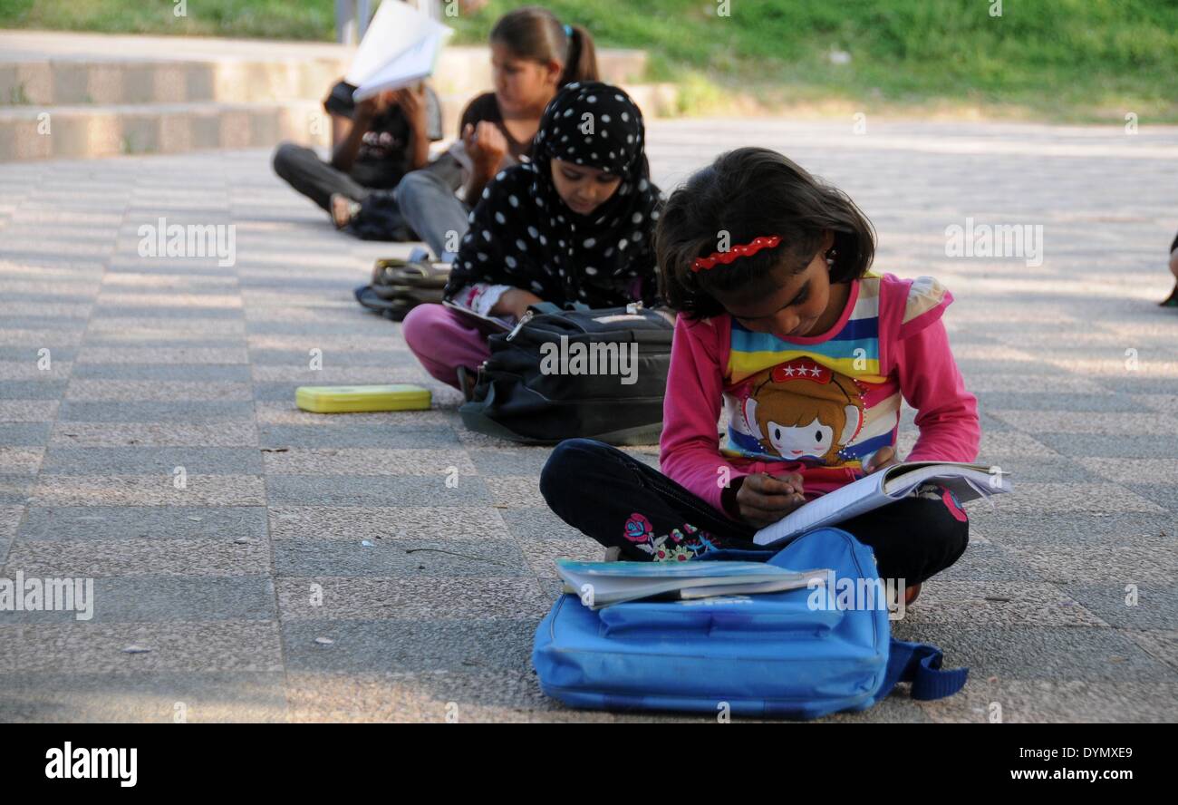 ISLAMABAD, PAKISTAN-APRIL 22:Underprevileged Pakistani children study ...