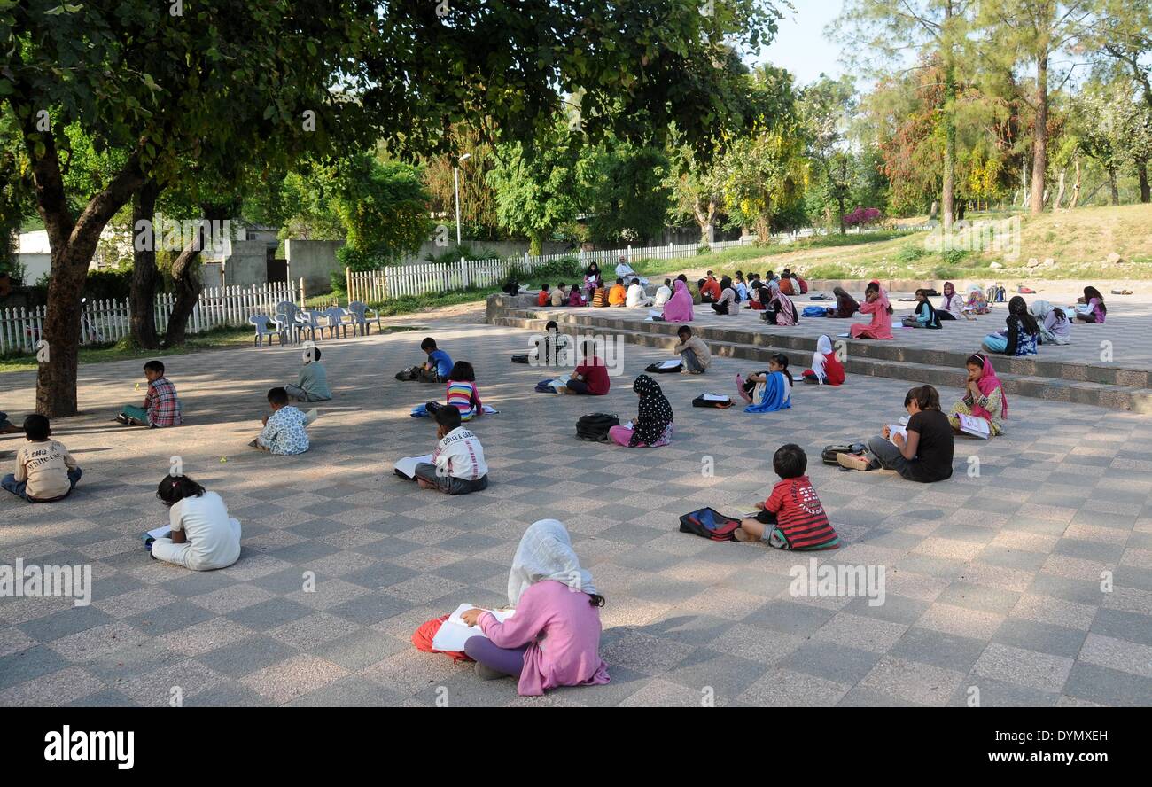 ISLAMABAD, PAKISTAN-APRIL 22:Underprevileged Pakistani children study ...