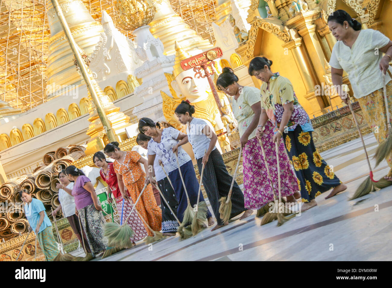 Ladies cleaning Shwedagon Pagoda, Yangon, Myanmar Stock Photo - Alamy
