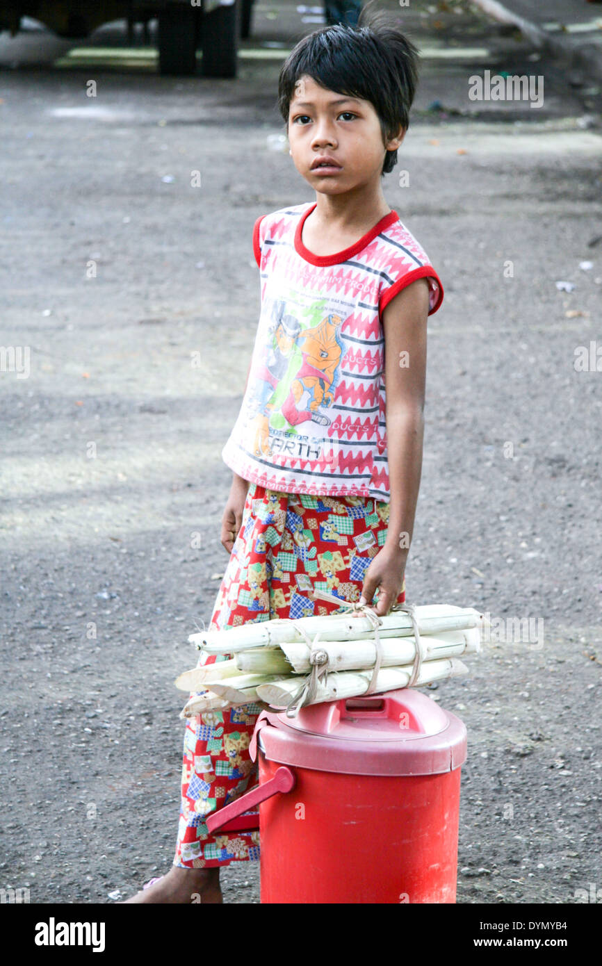 Seller on the street of Yangon. Myanmar Stock Photo - Alamy