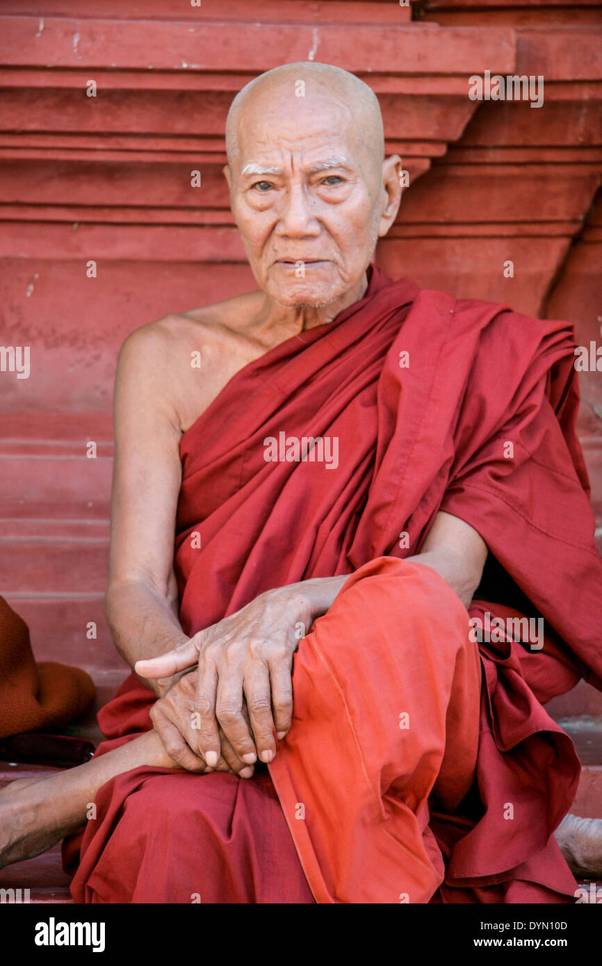 Monk relaxing in Shwedagon Pagoda Yangon Burma Stock Photo - Alamy