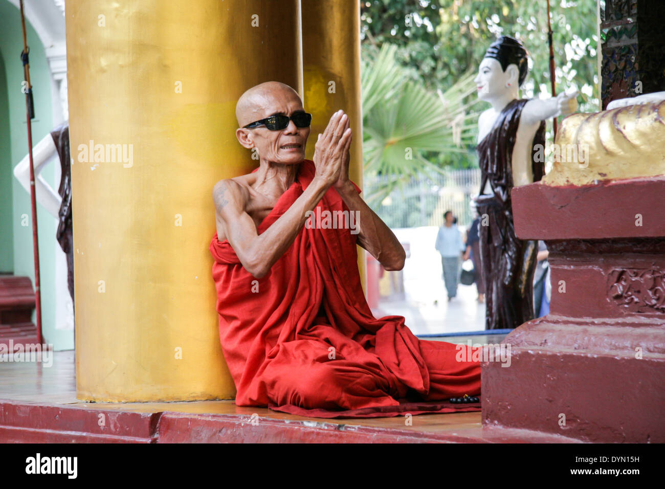 a blind monk praying in Shwedagon Pagoda Yangon Burma Stock Photo - Alamy