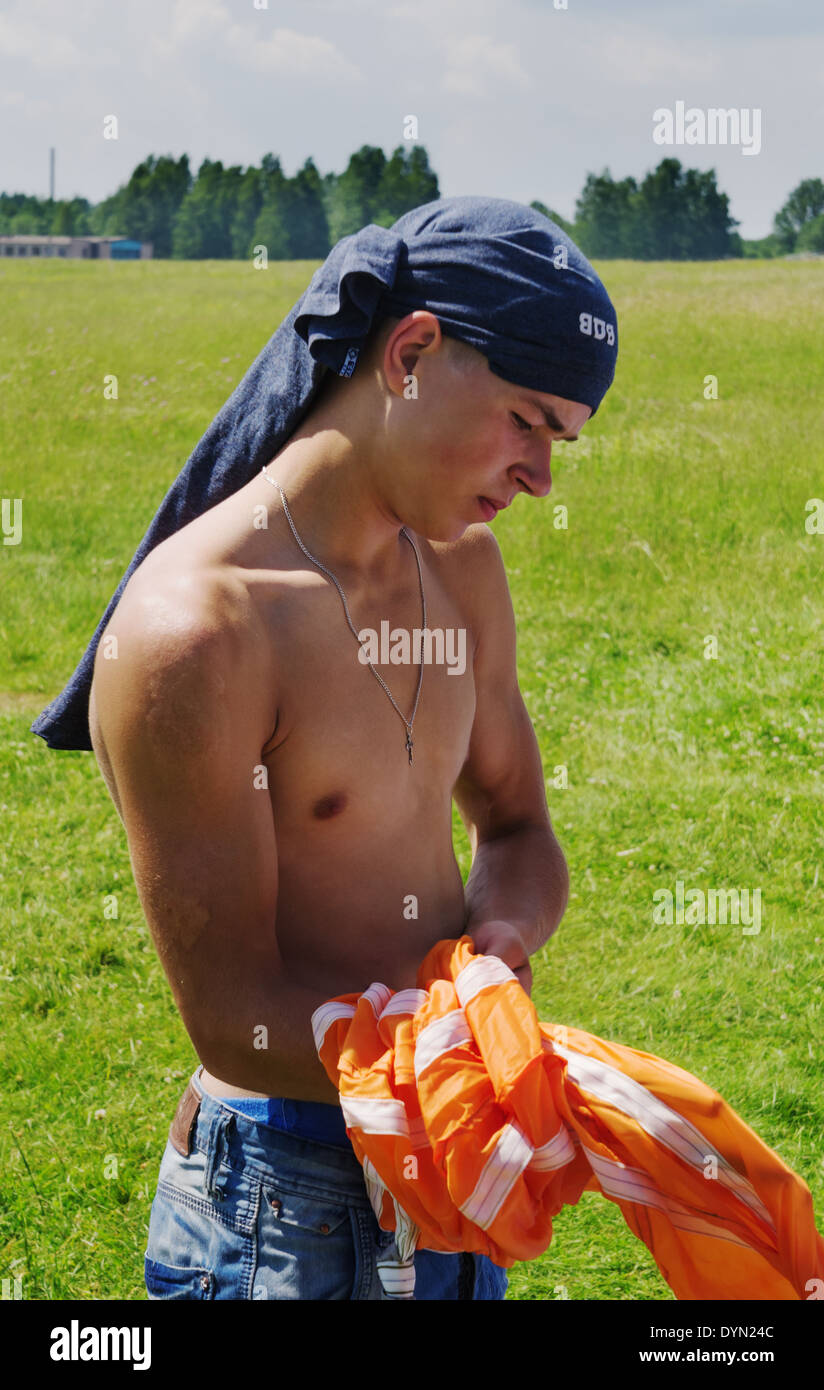 One day with parachutist in airfield. Parachute packing Stock Photo - Alamy