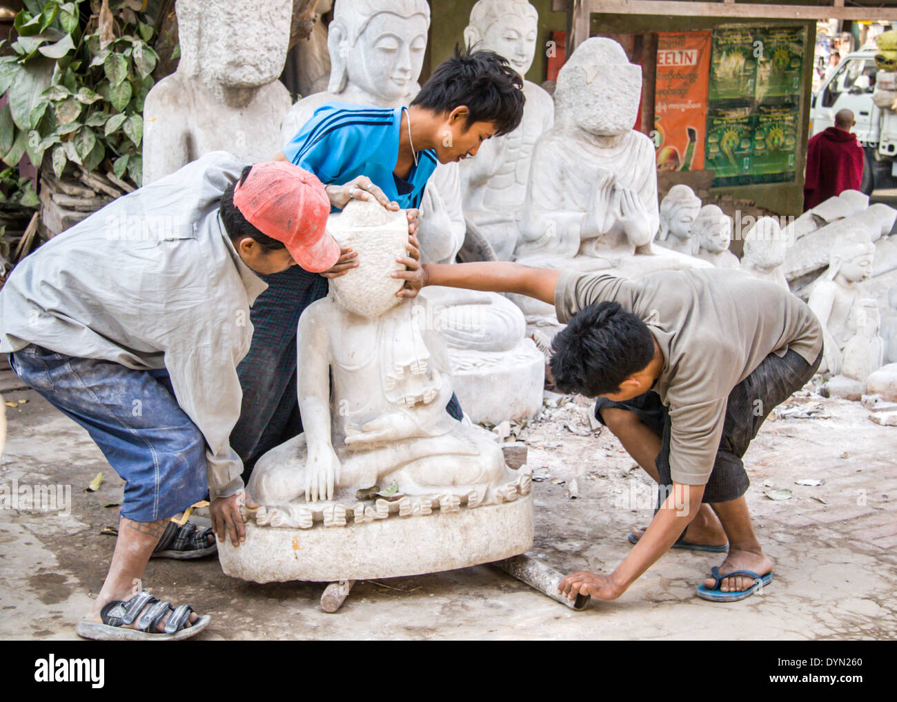 Men moving Buddha statue Mandalay Myanmar Burma Stock Photo - Alamy