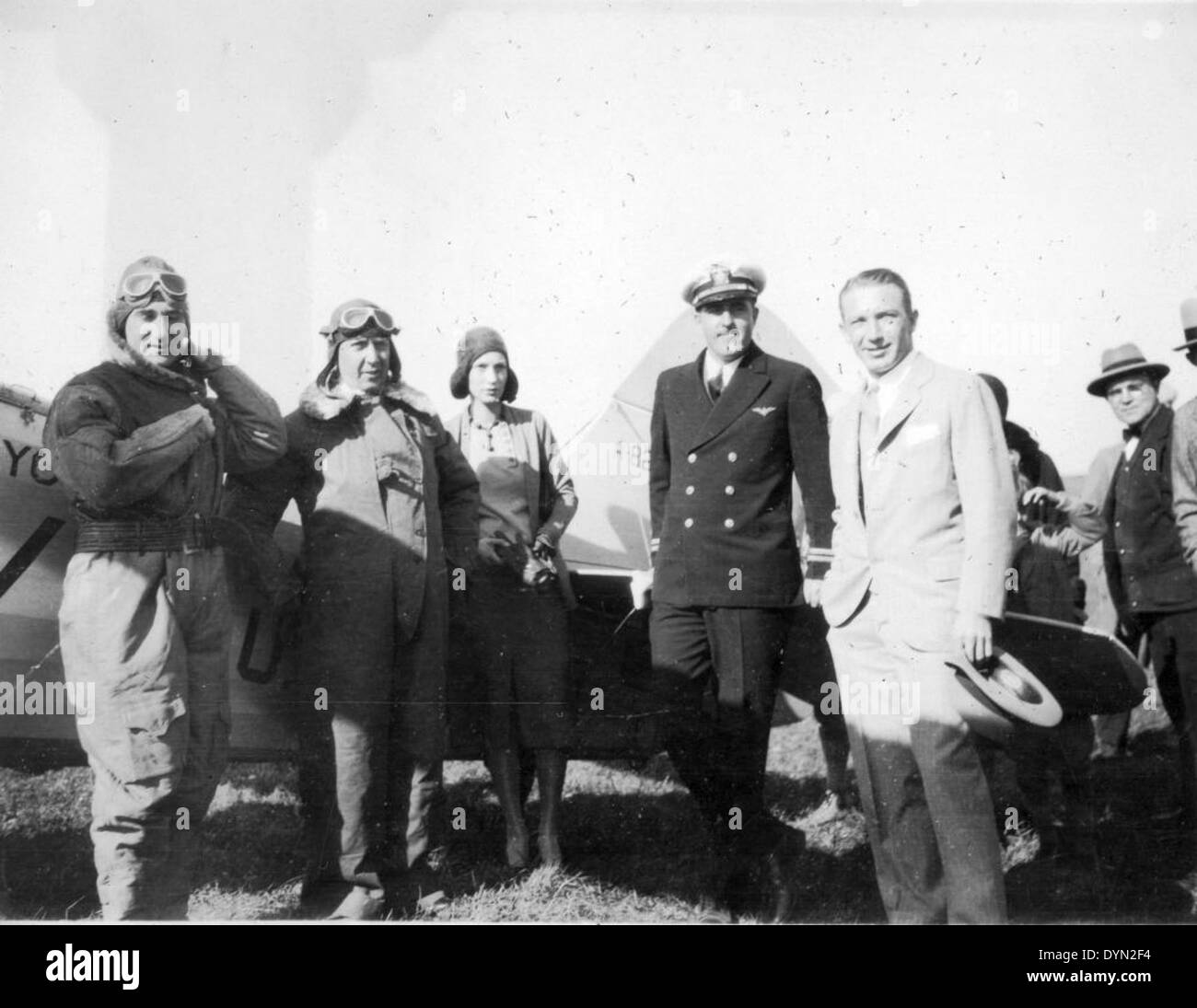 This image features naval aviators performing at an airshow, showcasing ...