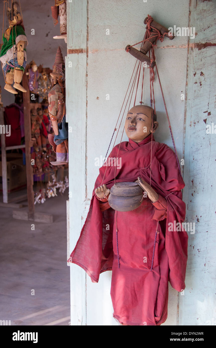 monk puppet on the wall of a shop Irrawaddy river Mingun Pagoda Myanmar ...
