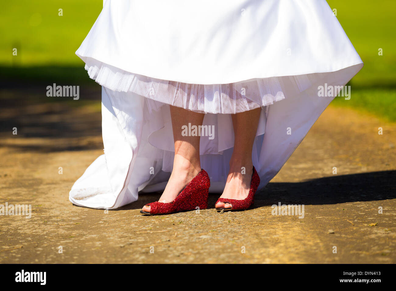 Red shoes worn by the bride on her wedding day Stock Photo - Alamy
