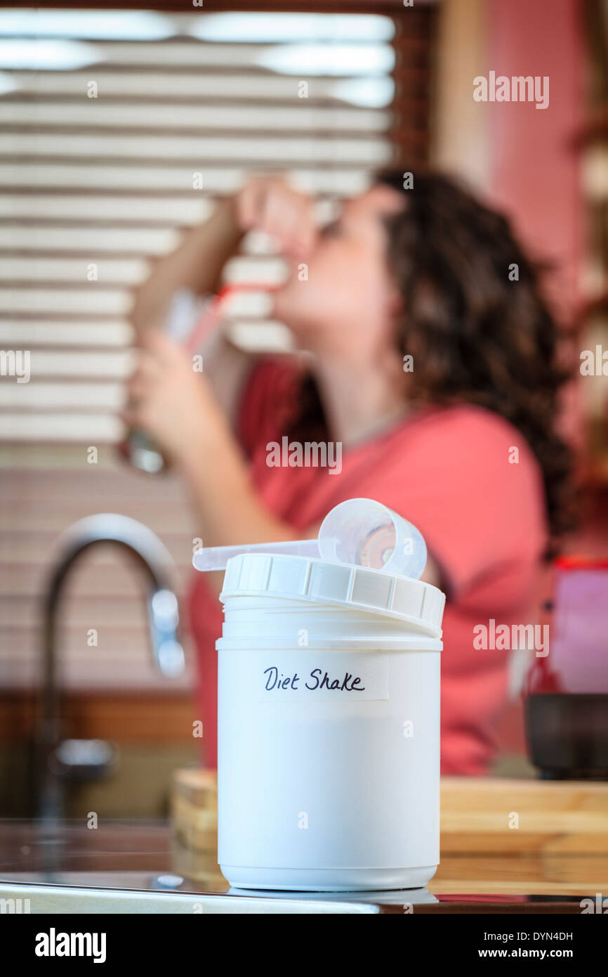 Woman drinking diet shake hi-res stock photography and images - Alamy