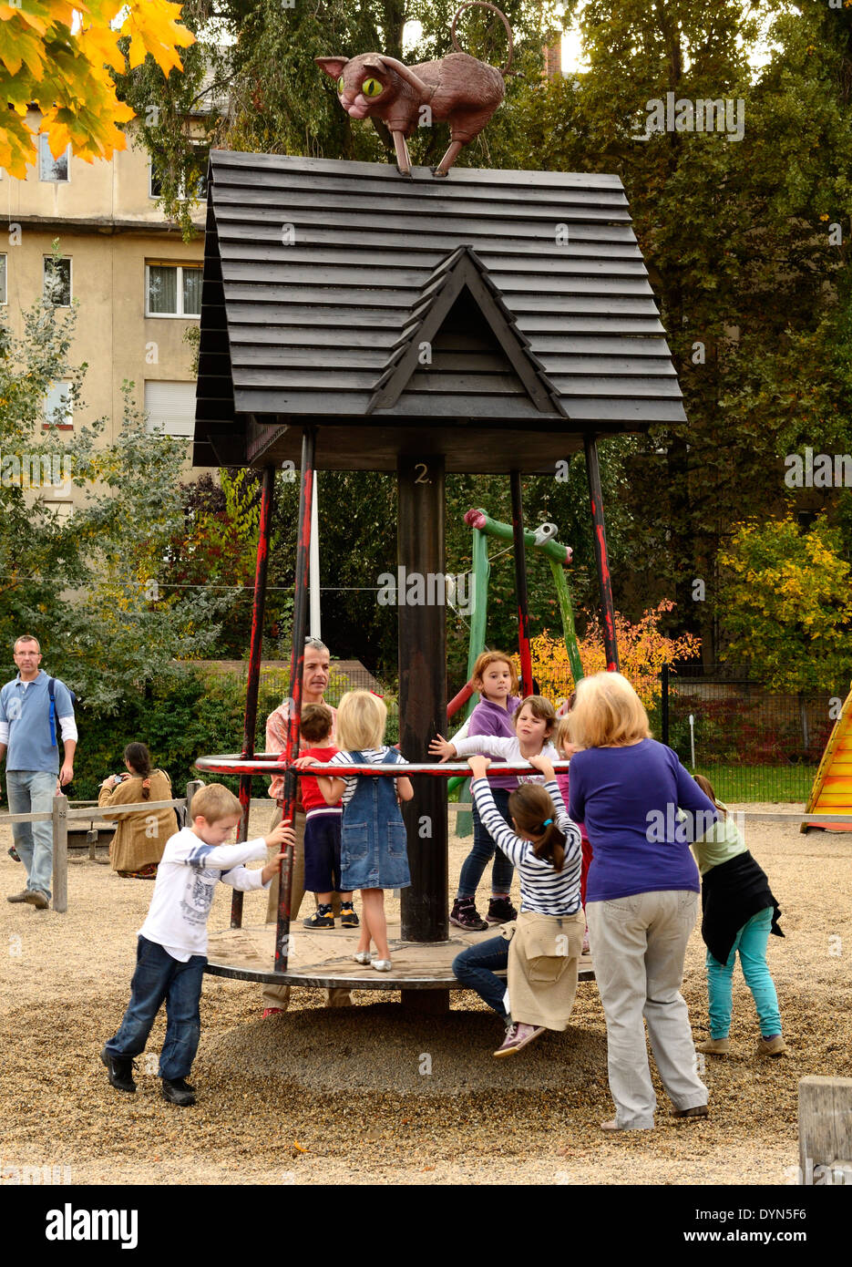 Children enjoy rotation toy at playground in Budapest Hungary Stock ...