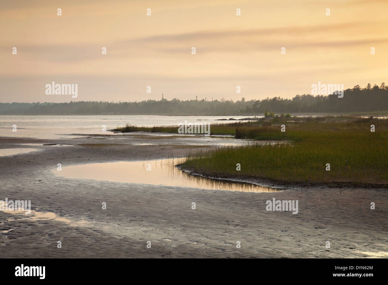 Hazy conditions at sunset over Lake Huron at Singing Sands, Bruce ...