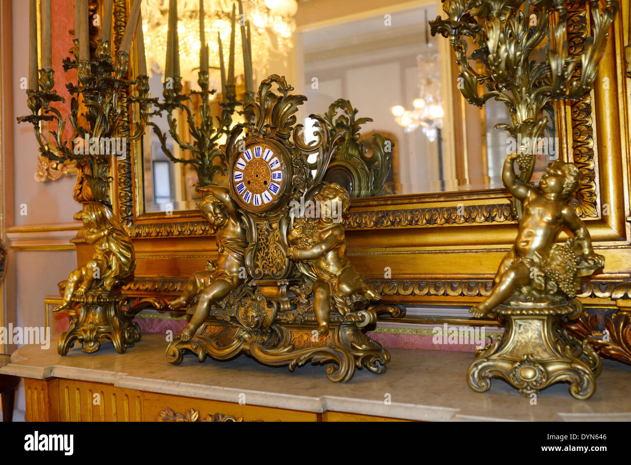 Bronze gilded clock and candelabras on console table in the Old Havana ...