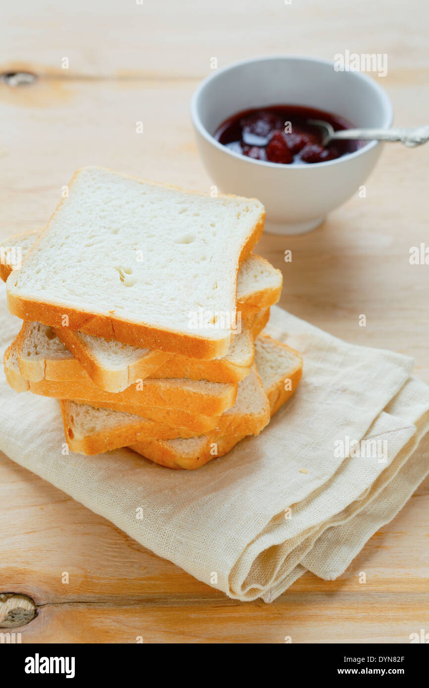 stack of white bread and jam in a bowl, food closeup Stock Photo - Alamy