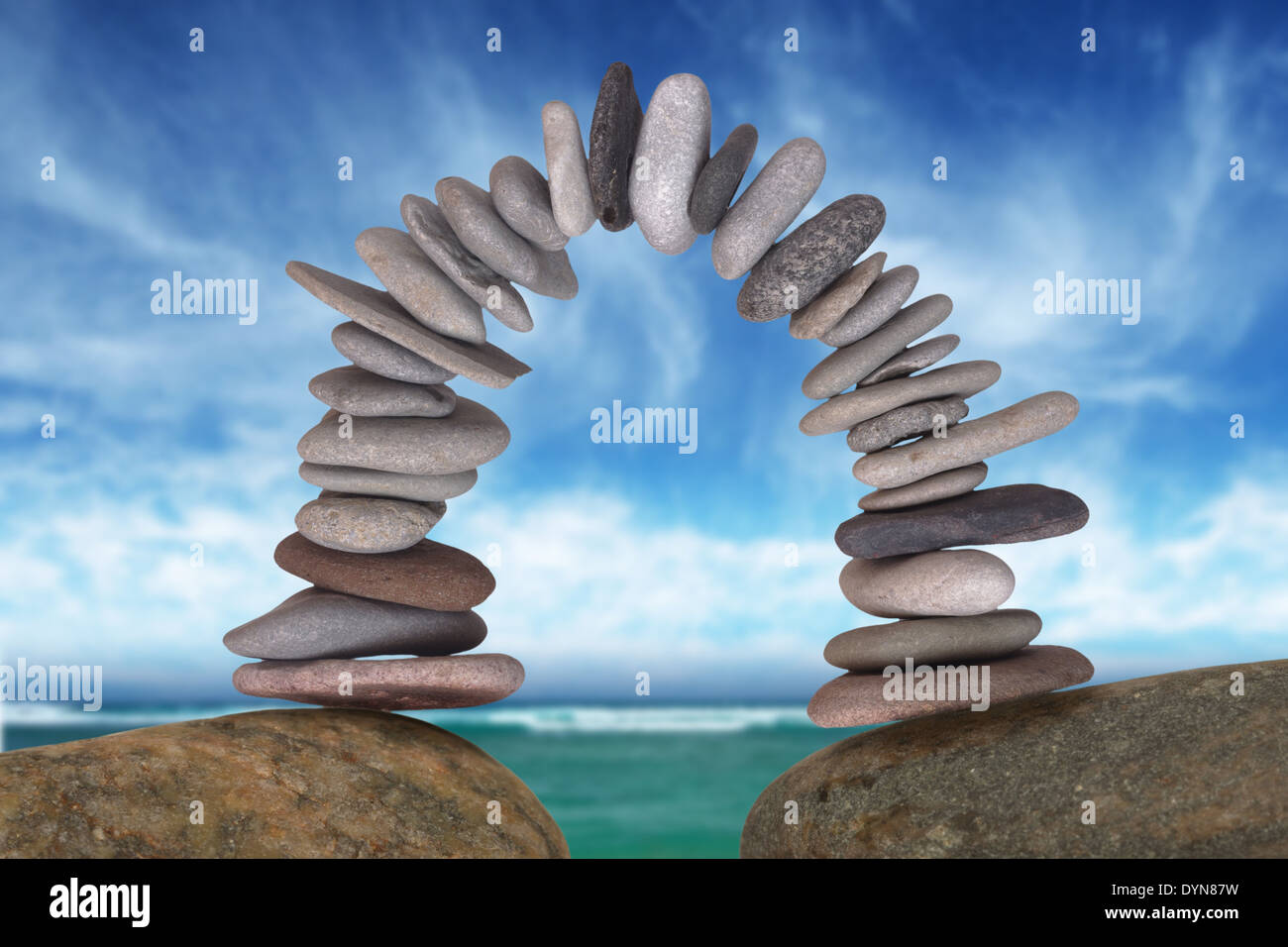 stone bow on a sea and sky background Stock Photo - Alamy