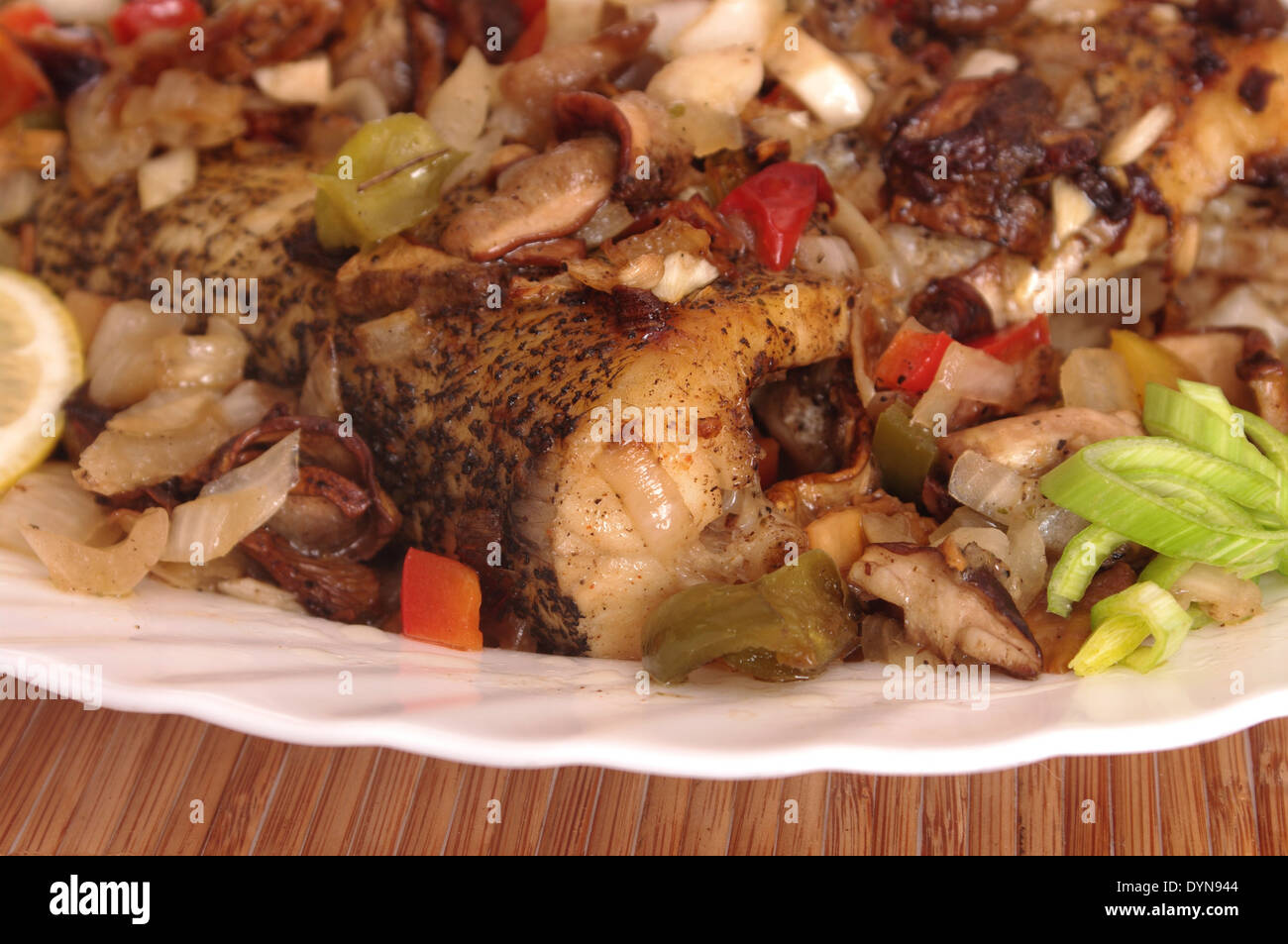 baked on plate on white background fish Stock Photo - Alamy