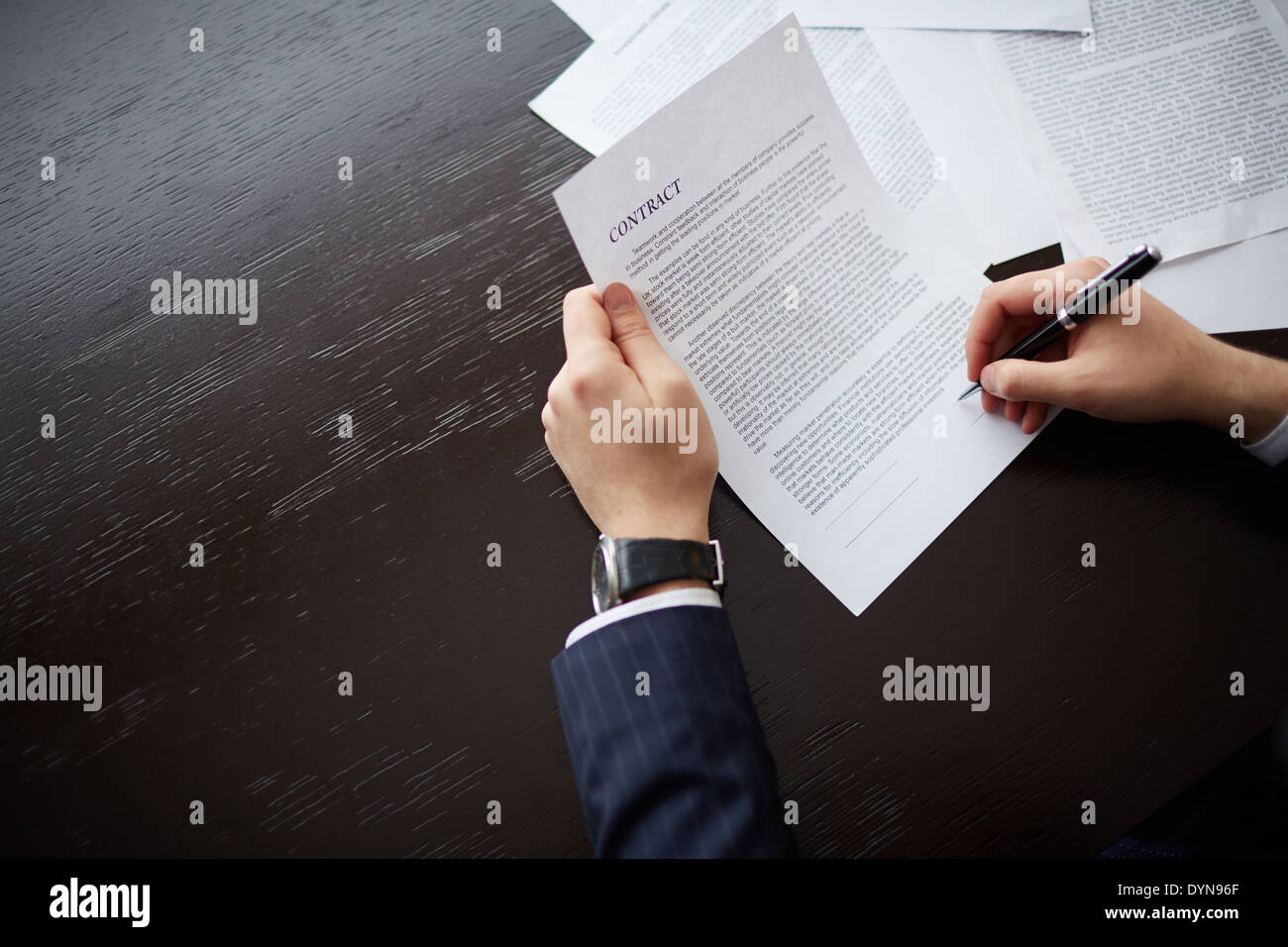 Image of businessman hands signing contract at workplace Stock Photo ...