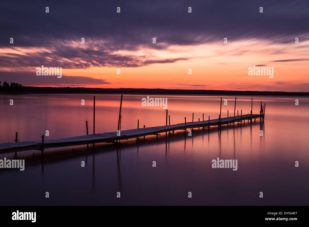 Dramatic sky over a idyllic lake Stock Photo - Alamy