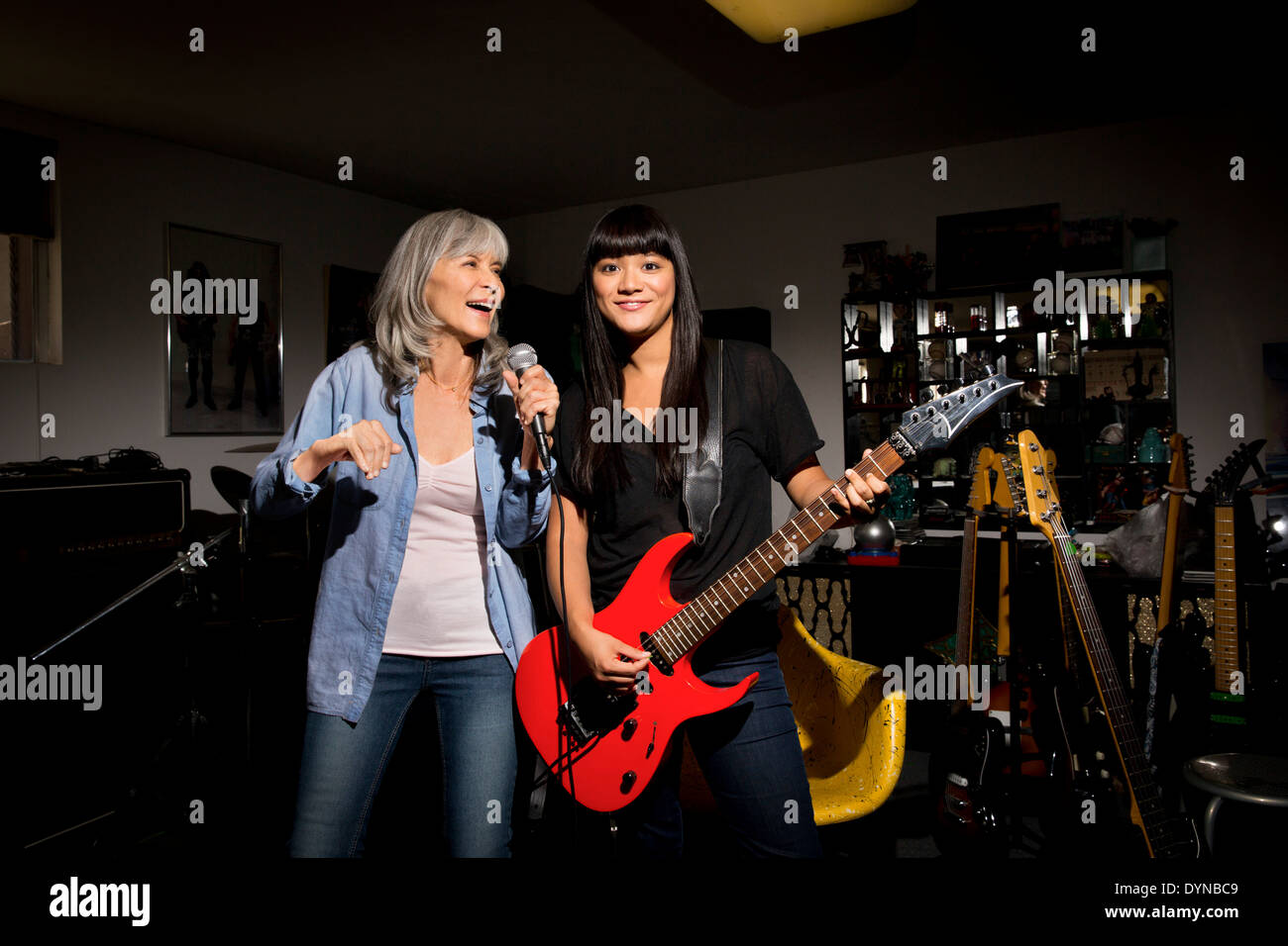 Elderly mother and daughter singing hi-res stock photography and images ...