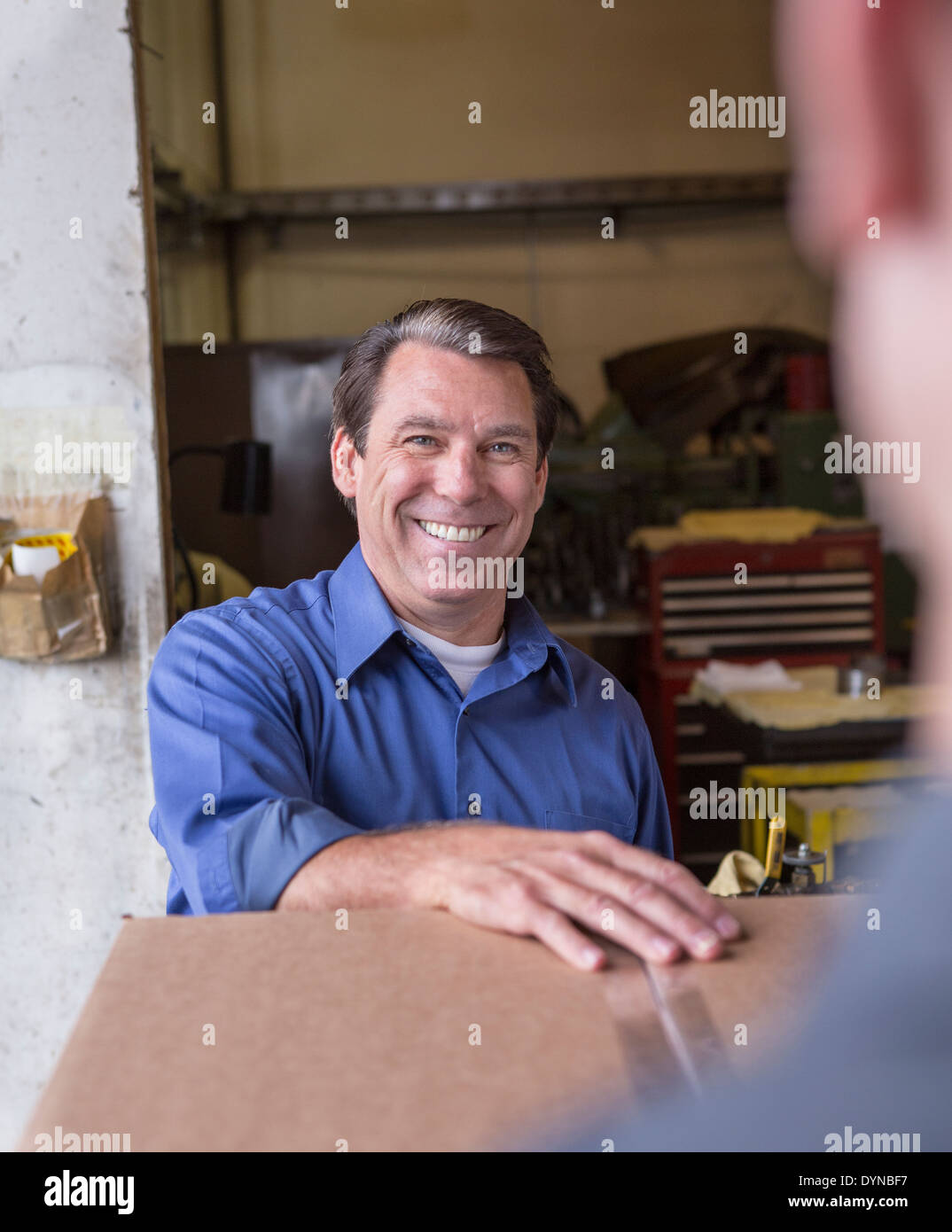 Smiling worker in close up hi-res stock photography and images - Alamy