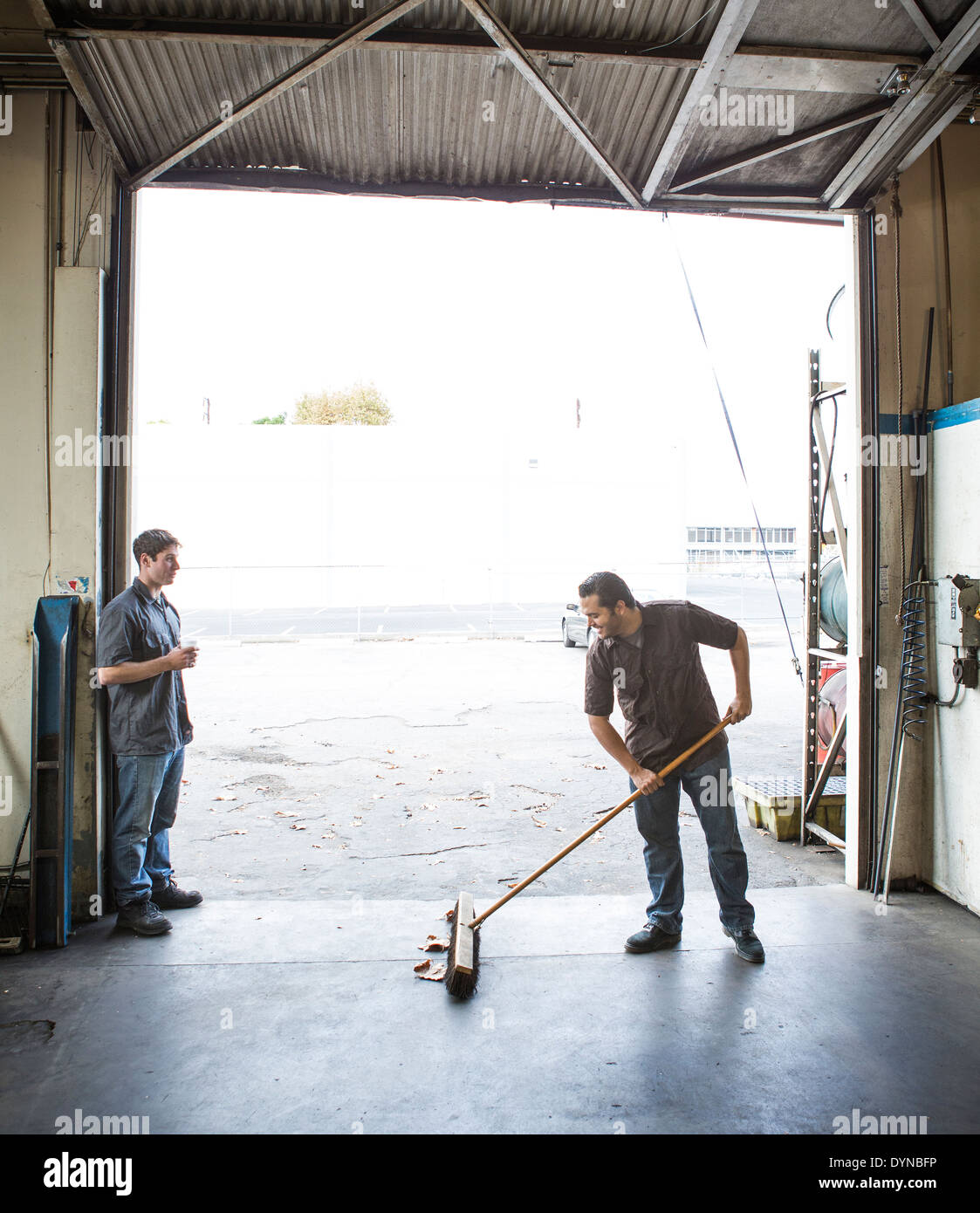 Blue collar worker sweeping hi-res stock photography and images - Alamy