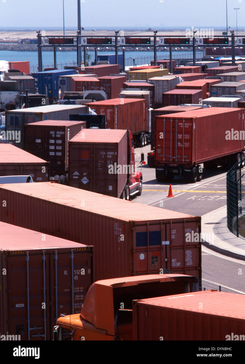 Trucks in queue at shipping terminal, Port of Los Angeles, California ...
