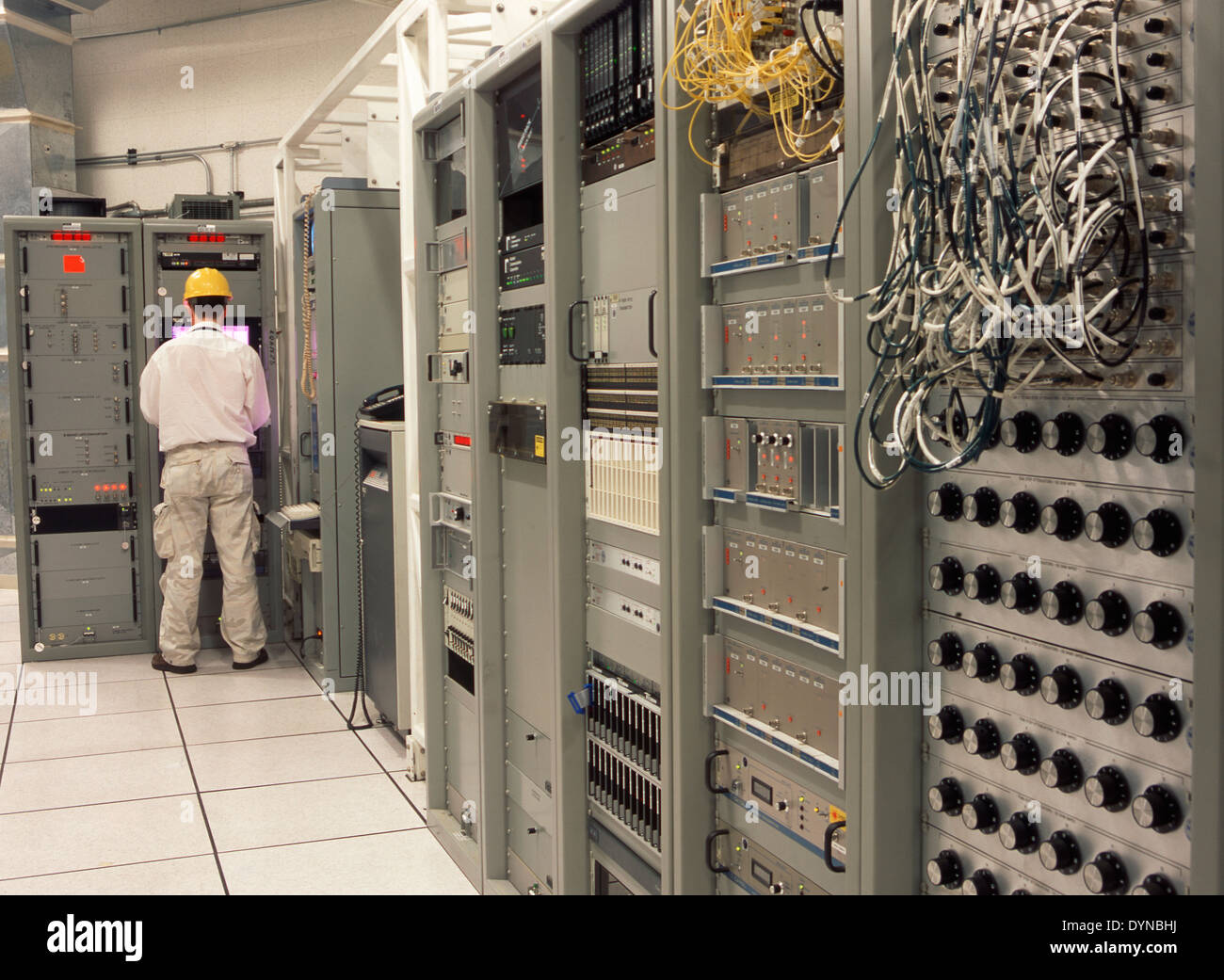 Computer programmer working in server room Stock Photo - Alamy