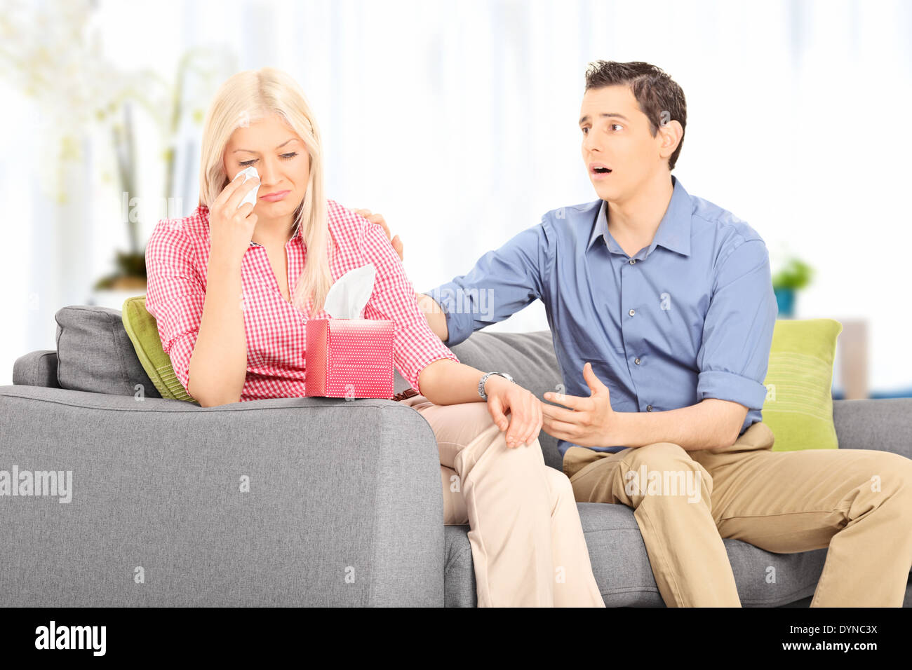 Woman crying man comforting hi-res stock photography and images - Alamy