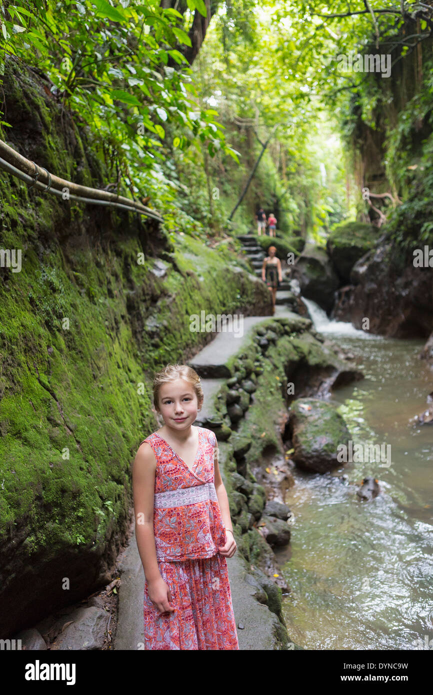 Caucasian girl smiling in tropical rainforest Stock Photo - Alamy