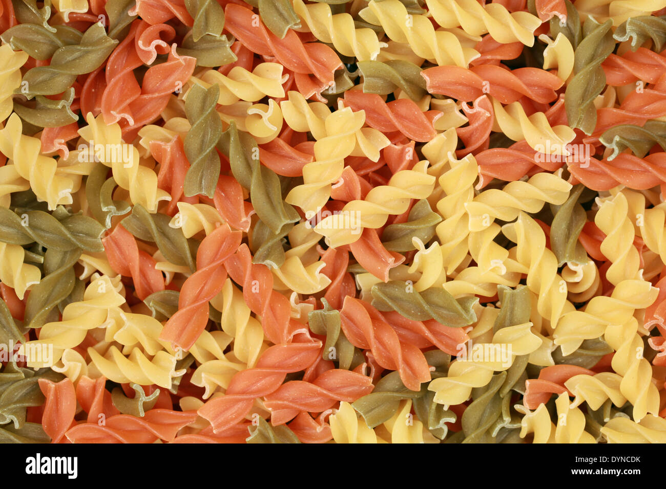 Colorful italian Pasta forming a noodle background Stock Photo - Alamy