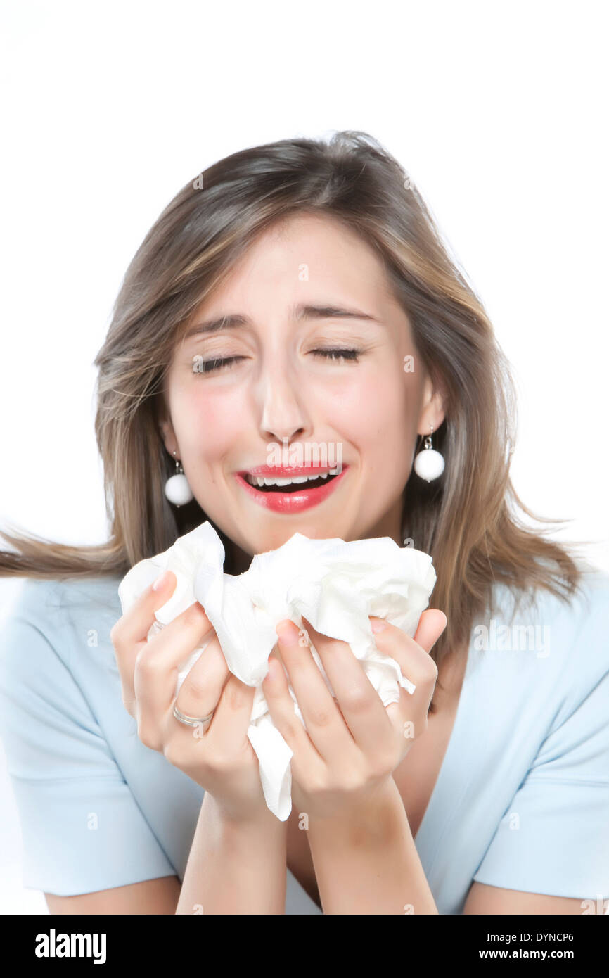Woman holding tissues upset hi-res stock photography and images - Alamy