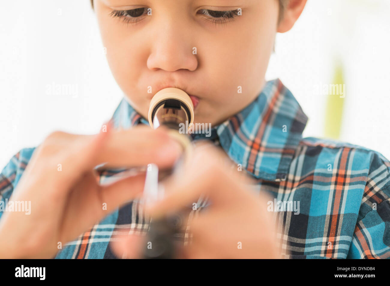 Boy playing recorder hi-res stock photography and images - Alamy