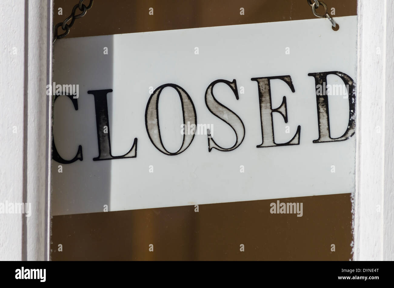 Closed sing in a window Stock Photo - Alamy