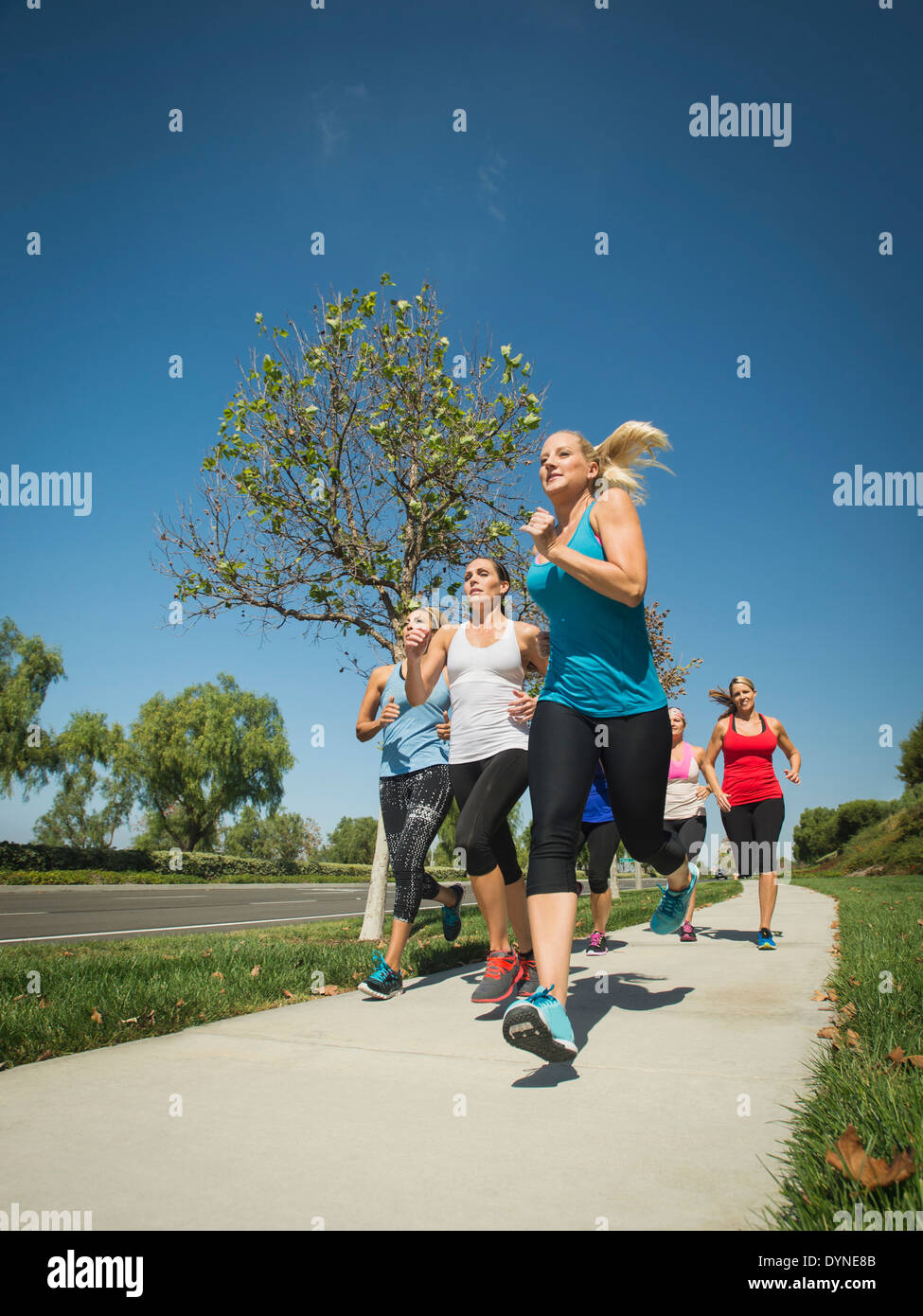 People jogging together outdoors Stock Photo - Alamy