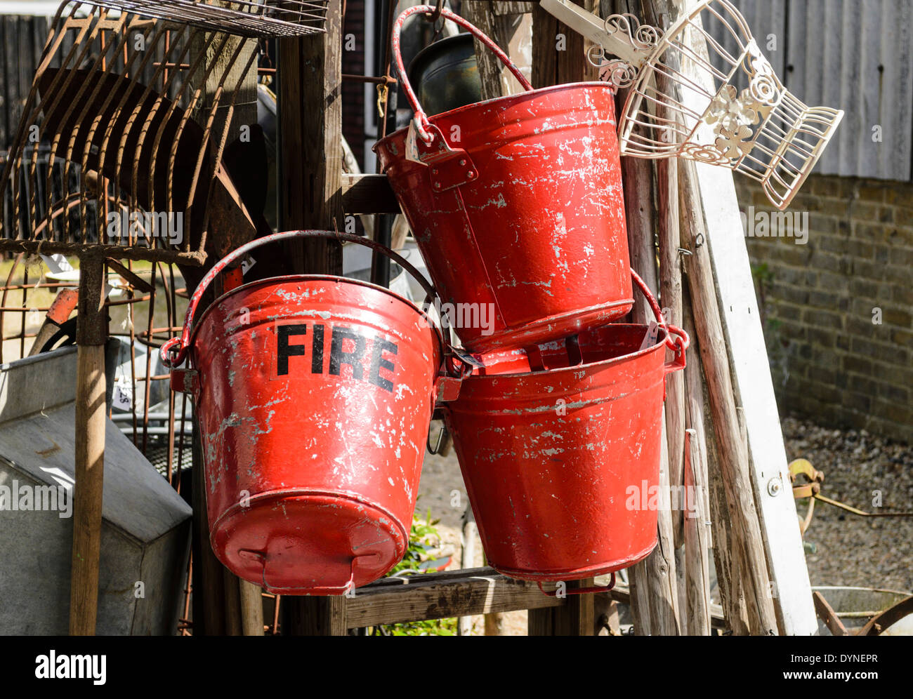 Old fire buckets hanging up Stock Photo - Alamy