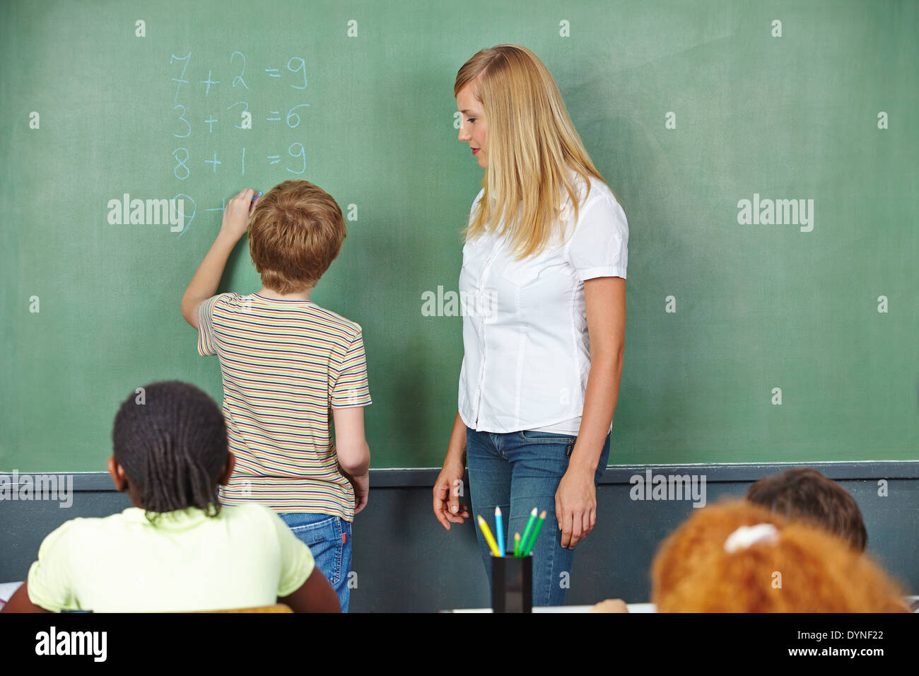 Children doing maths hi-res stock photography and images - Alamy
