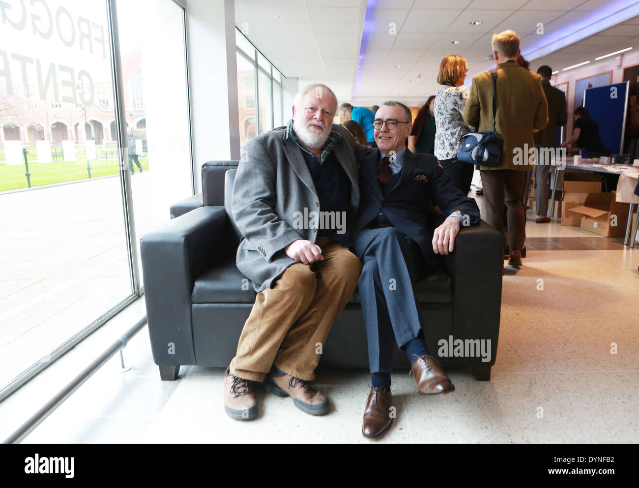 Ciaran Carson (right) shares a sofa, has he laughs with friend Michael ...