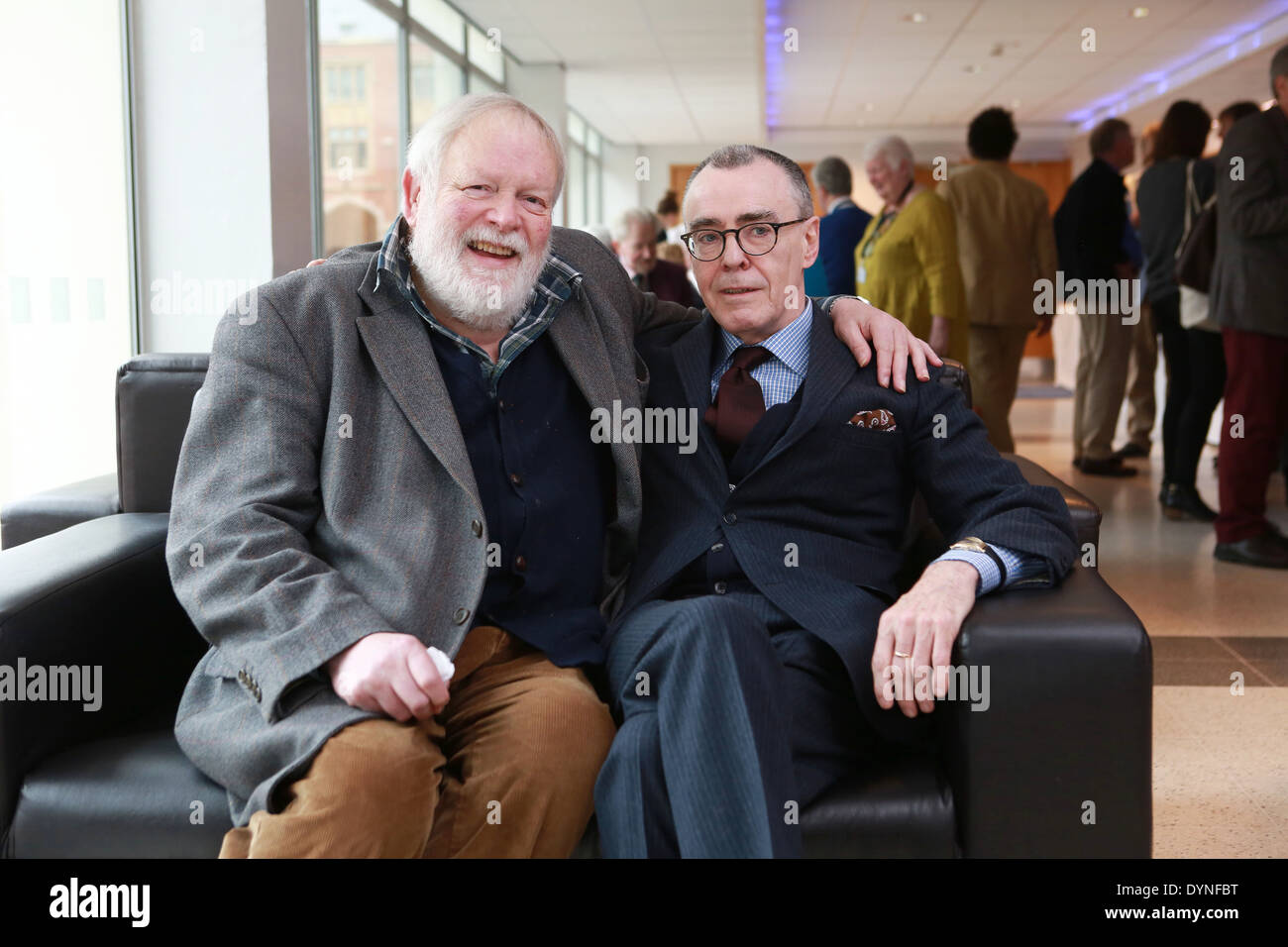 Ciaran Carson (right) shares a sofa, has he laughs with friend Michael ...