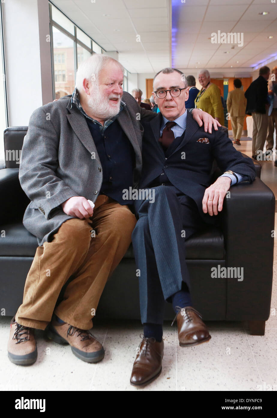 Ciaran Carson (right) shares a sofa, has he laughs with friend Michael ...