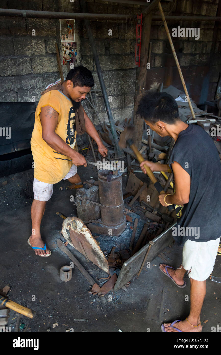 Blacksmiths at work in Puerto Princesa, Palawan, Philippines Stock ...