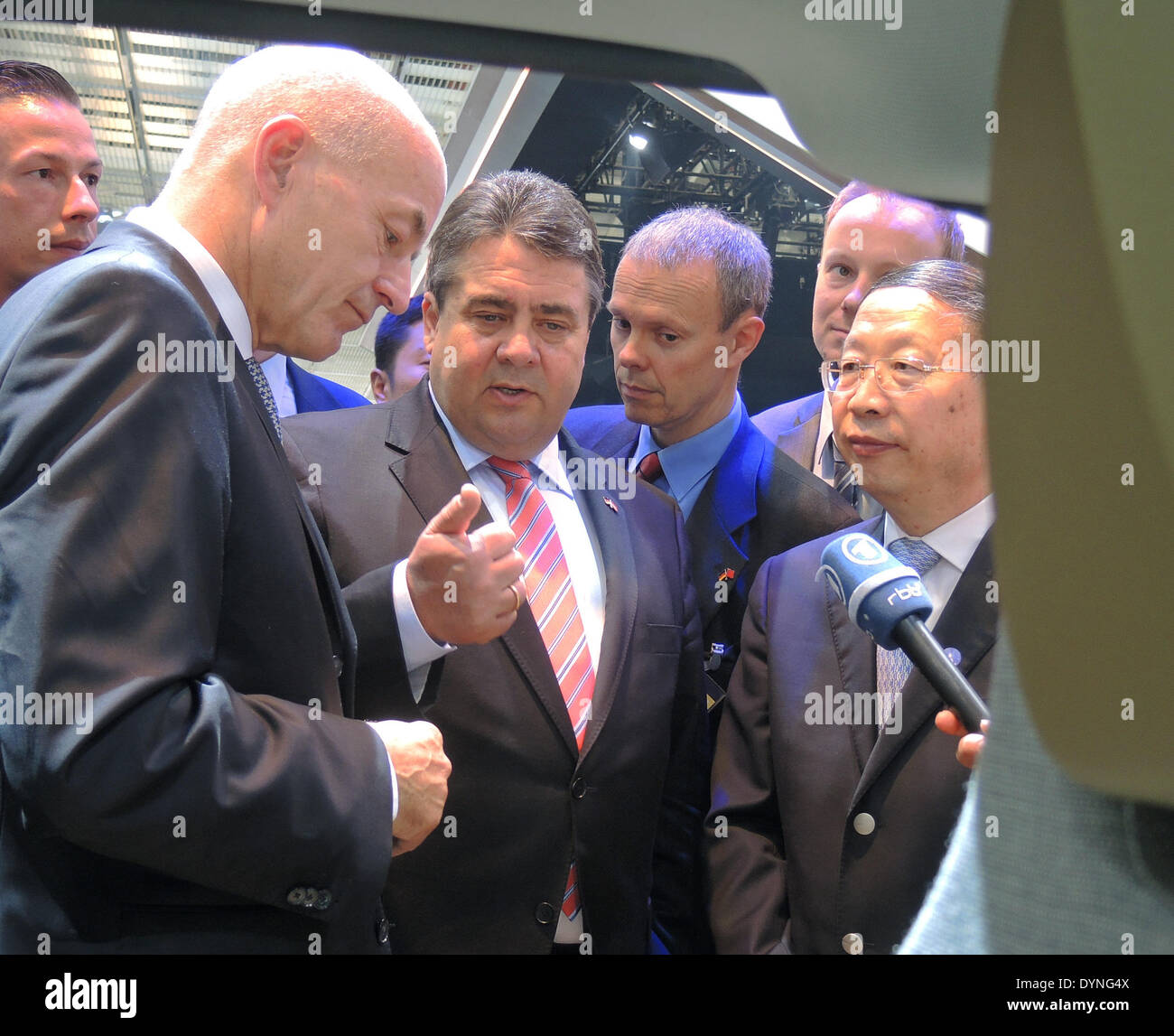 Beijing, China. 23rd Apr, 2014. Head of BMW China, Karsten Engel (L ...