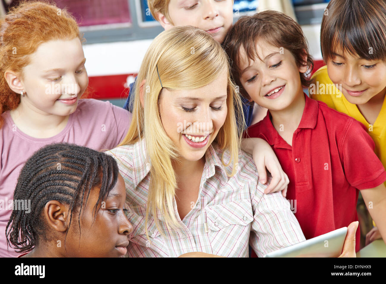 Kids children boy girl students looking teacher hi-res stock ...